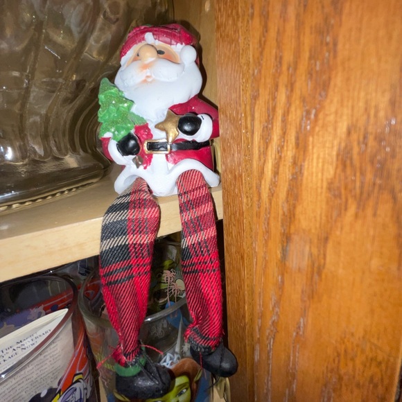 no brand | Holiday | Small Santa Sitting On A Shelf Behind Glass | Poshmark
